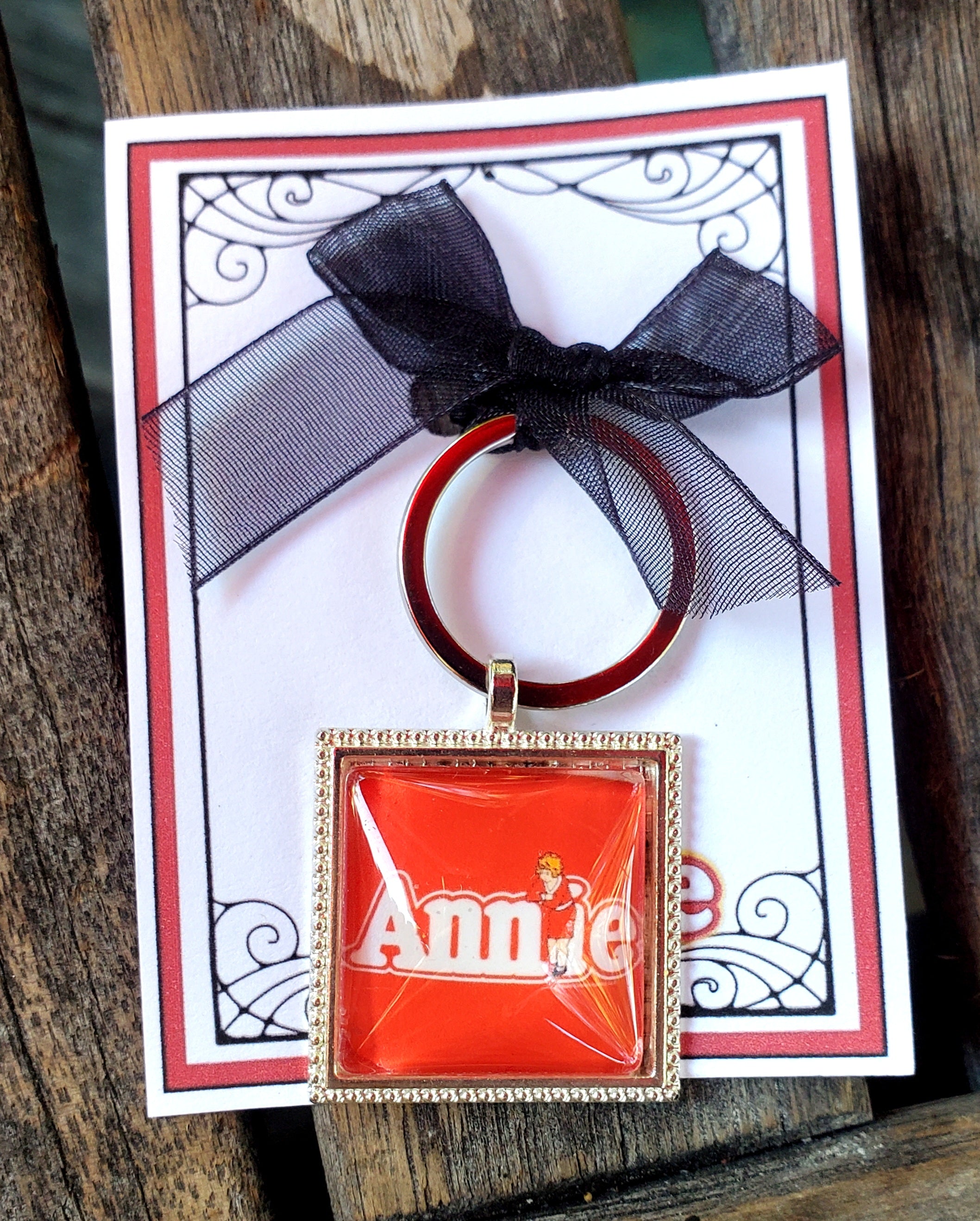 ANNIE "Show Logo" Glass Keychain – The Lobby Boutique