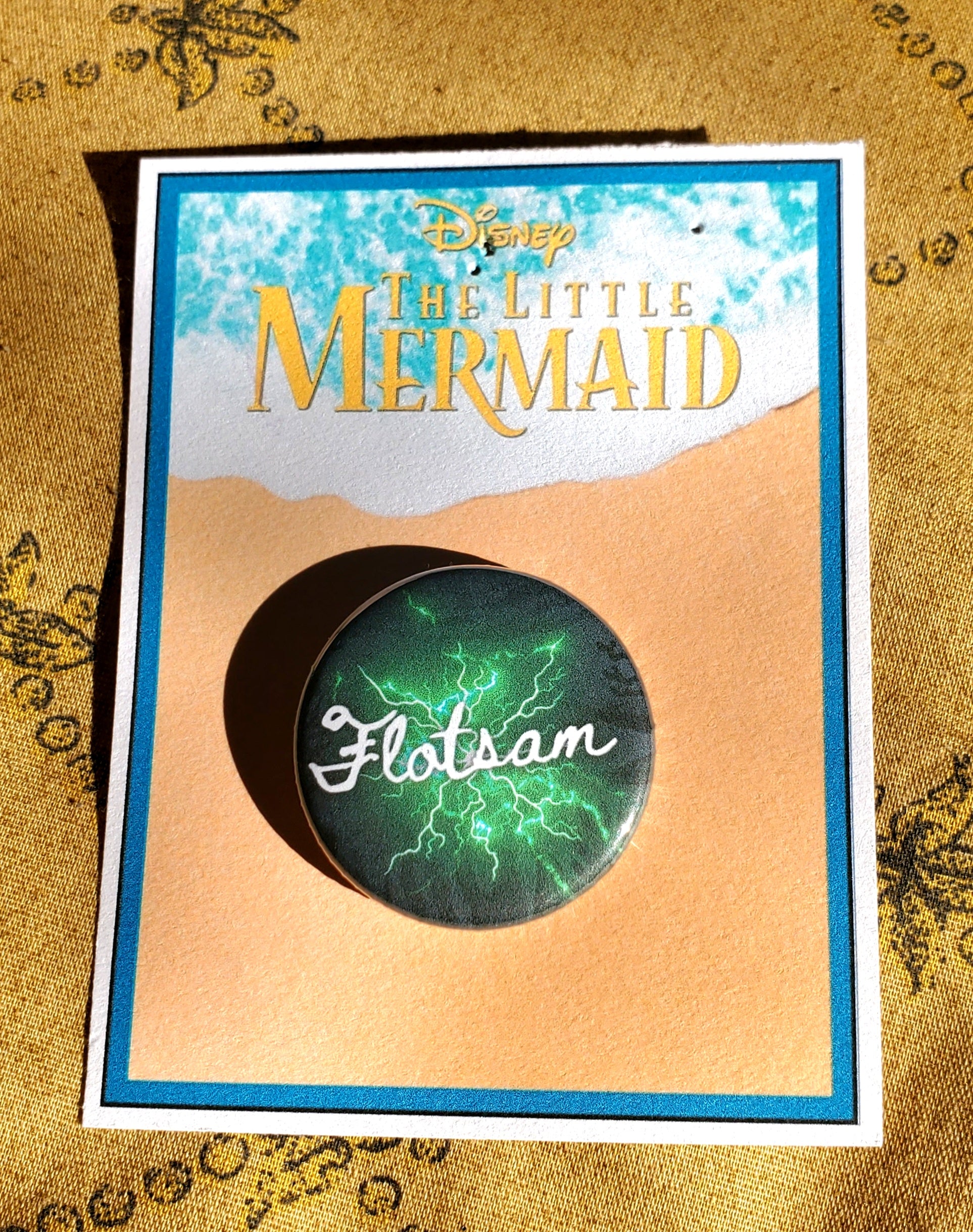 LITTLE MERMAID "FLOTSAM" Metal Pinback – The Lobby Boutique